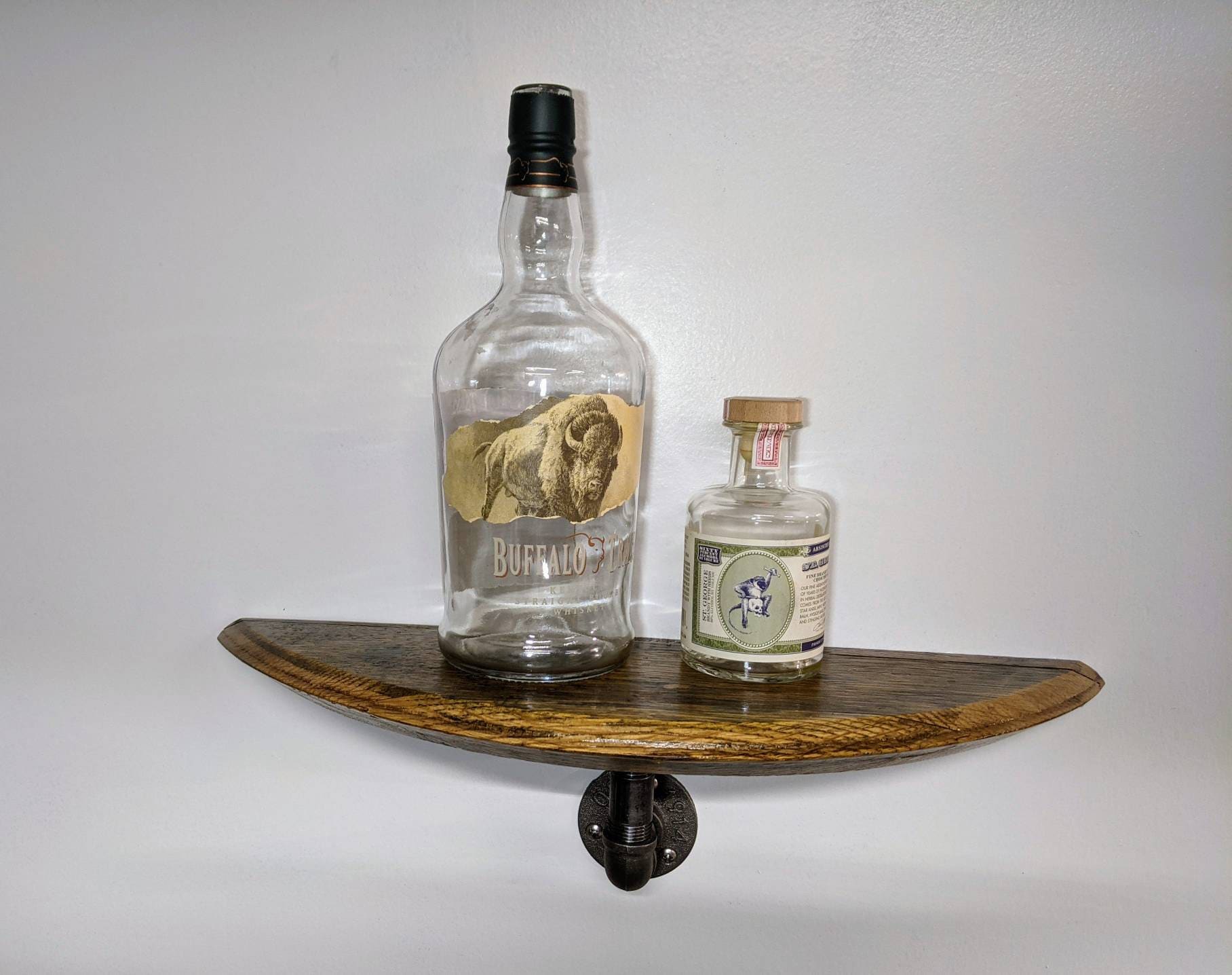 Bourbon barrel shelf with black pipe - Gambill Woodworking